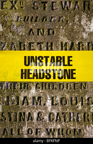 Warning sign on an unsafe headstone in Tottenham cemetery, London Stock ...