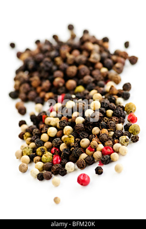 Peppercorns isolated on white background, top view Stock Photo - Alamy