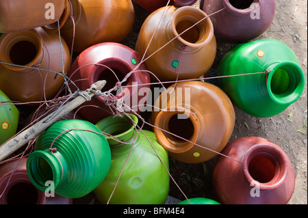 Plastic Indian water carrying pots Stock Photo - Alamy