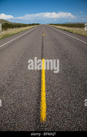 Empty road with yellow line Texas USA Stock Photo - Alamy