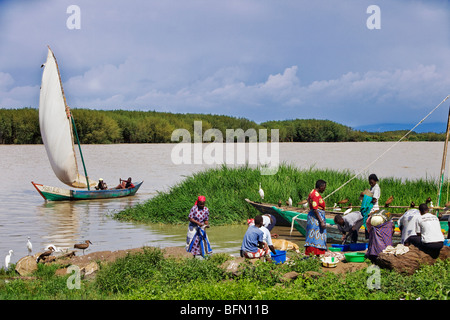 Kenya, Nyanza Province, Lake Victoria. Luo fishermen in their brightly ...