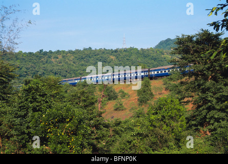 View of konkan rail train passing Chiplun ghat, Maharashtra, India ...