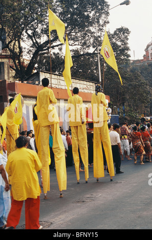 Tall men on stilts, stilt walkers parade costume Dublin Ireland Stock ...