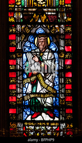 Stained glass window showing Moses and the Ten Commandments inside ...
