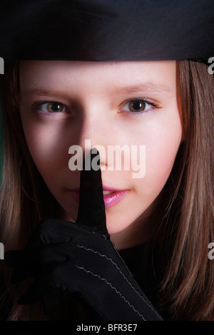 portrait of a pretty eleven years old girl putting on makeup Stock ...