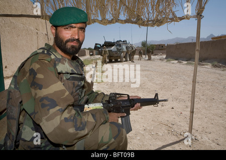 Afghan national army soldiers police brass at the M240B machine gun ...