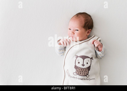 Newborn baby boy looking and observing the world, first day of life ...