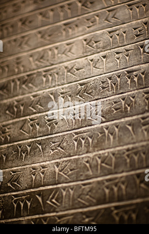 Ancient sumerian stone carving with cuneiform scripting Stock Photo - Alamy