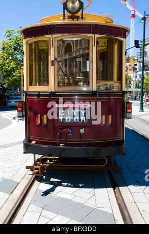 Vintage old electric tram at stop station, clean environment city means ...