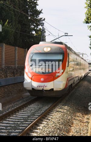 Spanish train arriving at station Stock Photo - Alamy