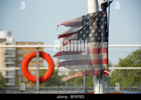 The American flag in tatters Stock Photo - Alamy