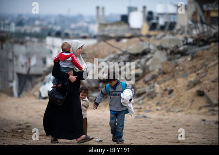 Destroyed buildings in the Gaza Strip are seen from southern Israel ...