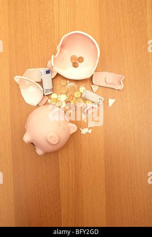 Smashed Piggy Bank Stock Photo - Alamy
