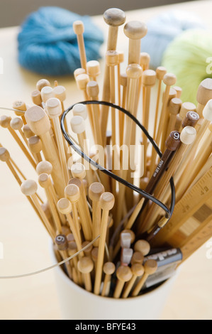 Close-up of knitting wooden knitting needles. Zero waste concept. Hobby ...