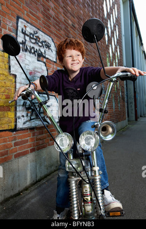 red haired boy on chopper bicycle Stock Photo - Alamy