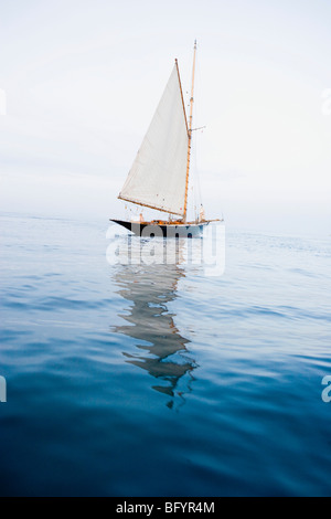 Woman standing in boat Stock Photo - Alamy