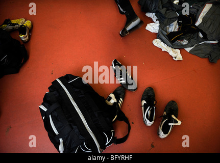A footballers changing room with dirty kit piled on the floor UK Stock ...