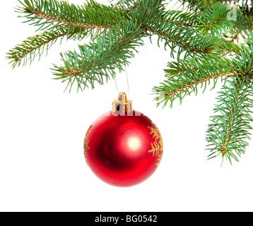 Fir branch with Christmas decoration on a dark blue-green painted ...