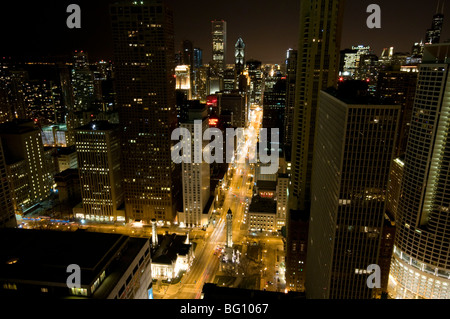 A night, aerial view of the Magnificent Mile and downtown Chicago, as ...