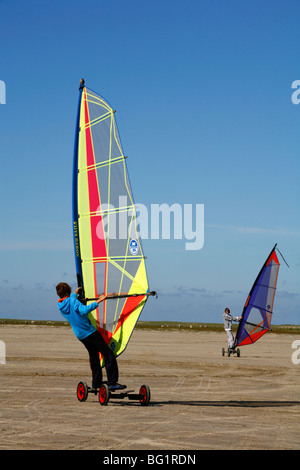 People windskating at Lakolk beach in Romo, Jutland, Denmark ...