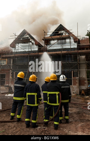 House roof on fire Stock Photo - Alamy