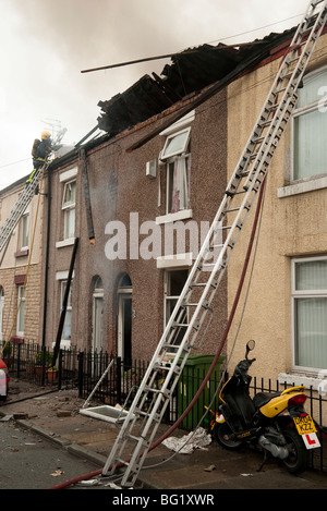 Terraced house fire following gas explosion Stock Photo - Alamy