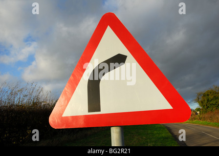 Road sign warning of Right-hand Bend in the road Stock Photo: 125771520 ...