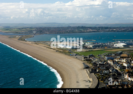 View across Portland, Chesil Beach & Weymouth harbour through the Stock ...