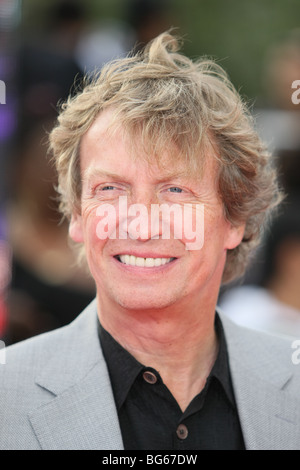 Television producer Nigel Lythgoe, left, embraces his son Kristopher at ...