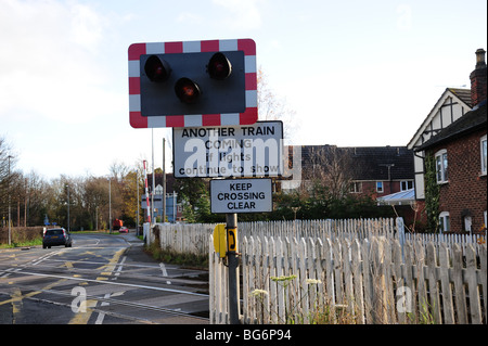 Half barrier railway level crossing Stock Photo - Alamy