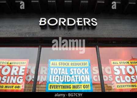 everything must go total liquidation closing signs in a store in ...