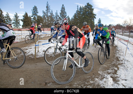 Cross racers on bicycles take part in the USA Cyclocross National ...