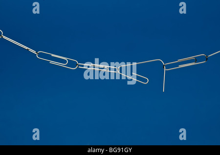 Bent paper clip Stock Photo - Alamy
