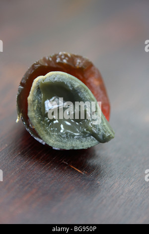 Chinese Century egg, preserved duck eggs. Orange background. Top view ...