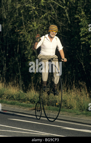 Man on a Penny-farthing riding down Regent Street in London england ...