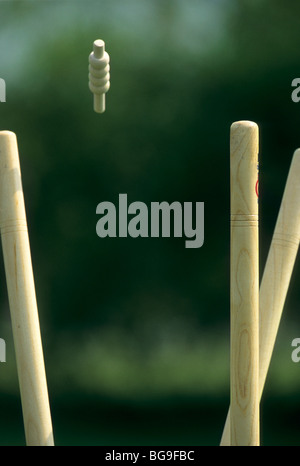 Close up of a wicket strike with bails flying Stock Photo - Alamy