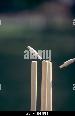 Close up of a wicket strike with bails flying Stock Photo - Alamy