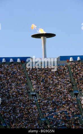 Olympic torch above a stadium Stock Photo - Alamy