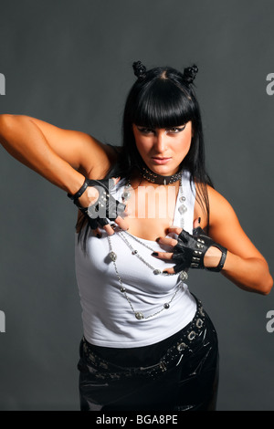 Heavy metal cheerleader young woman Stock Photo - Alamy