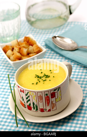 A closeup shot of a yellow cream soup Stock Photo - Alamy