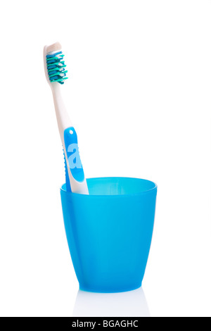 Plastic toothbrush on a white isolated background Stock Photo - Alamy