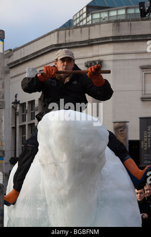 Mark Coreth on top of his Ice Bear Project sculpture, Trafalgar Square ...