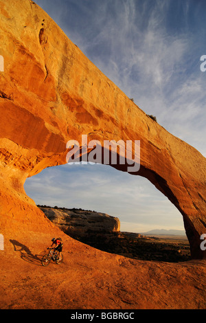 Mountain bikers at the stone arched bridge of Artotiva (also known as ...