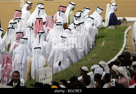 Men in traditional clothing, Dubai, United Arab Emirates Stock Photo ...