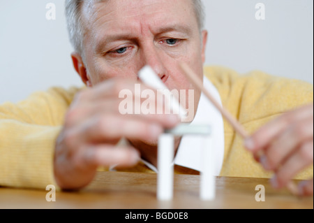 Man, engineer, inventor, architect thinking, playing, inventing ...