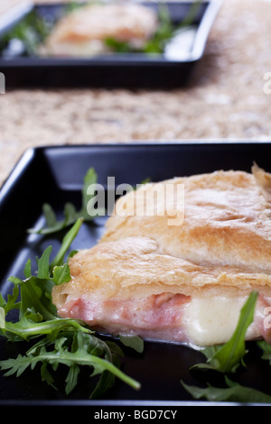 Mortadella ham and Edam cheese flan with fresh rucola salad on top ...