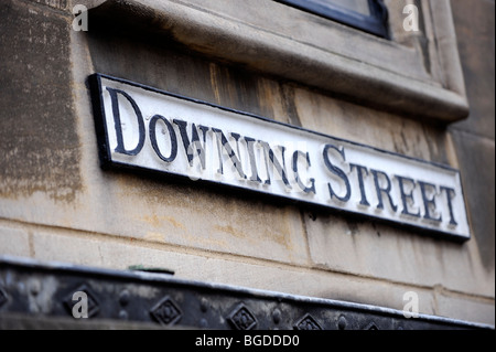 Road sign for Downing Street in postcode SW1, City of Westminster ...