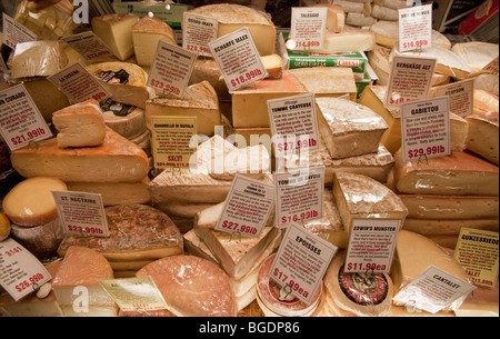Variety of cheeses on display in cheese room of farm shop, Suffolk ...
