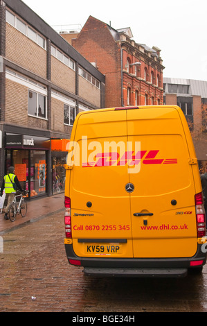 DHL yellow van on the street Stock Photo - Alamy