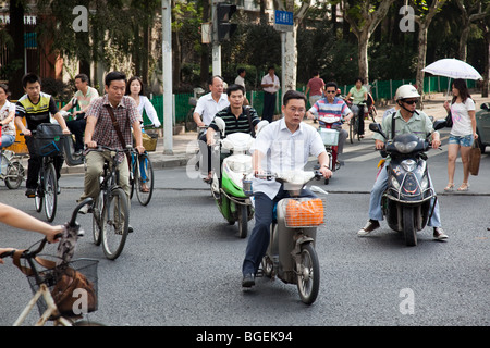 Moped riders in Shanghai Stock Photo: 27367346 - Alamy